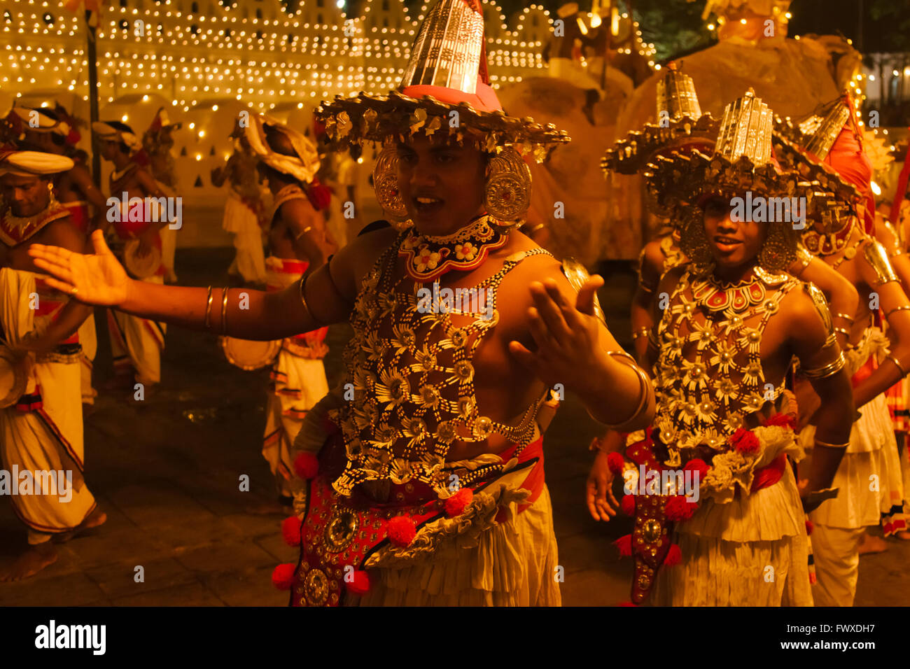 Procession passes by the Temple fo Tooth during Kandy Esala Perahera ...