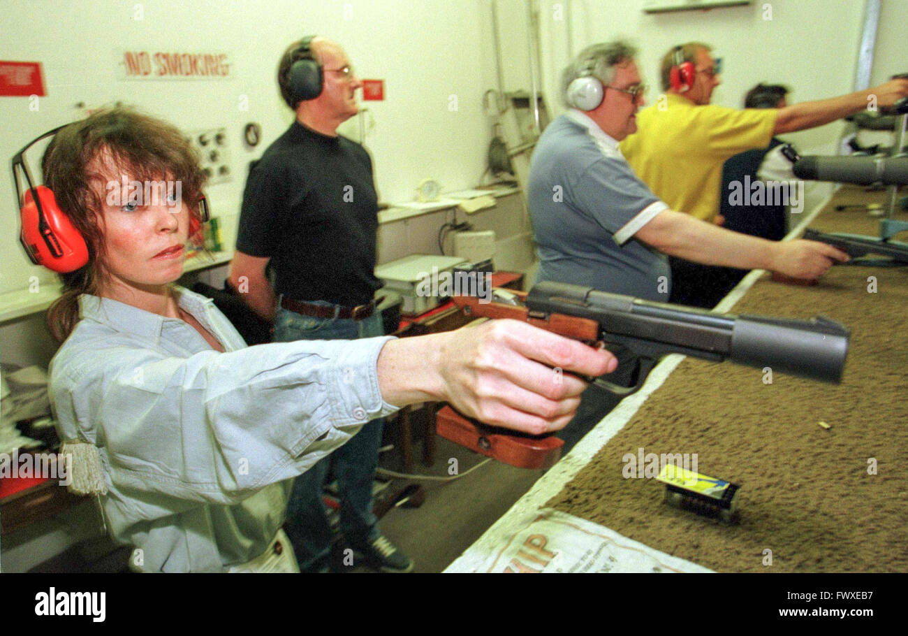 Members of a gun club practice on their indoor shooting range in Doune ...