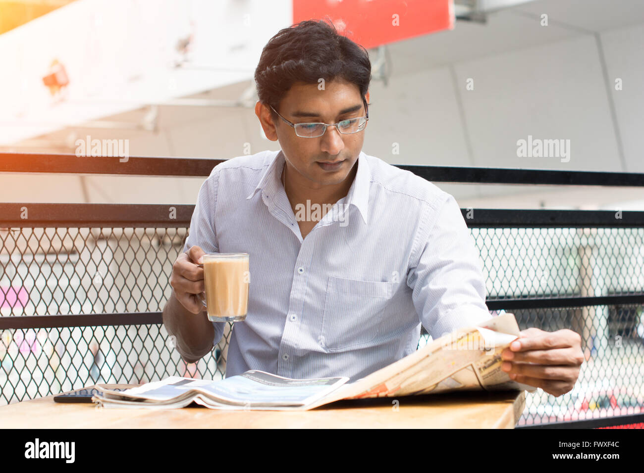 indian business male having milk tea Stock Photo - Alamy