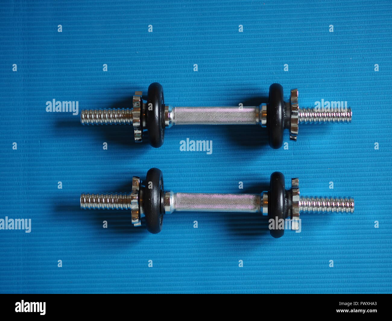 Blue weights hi-res stock photography and images - Alamy