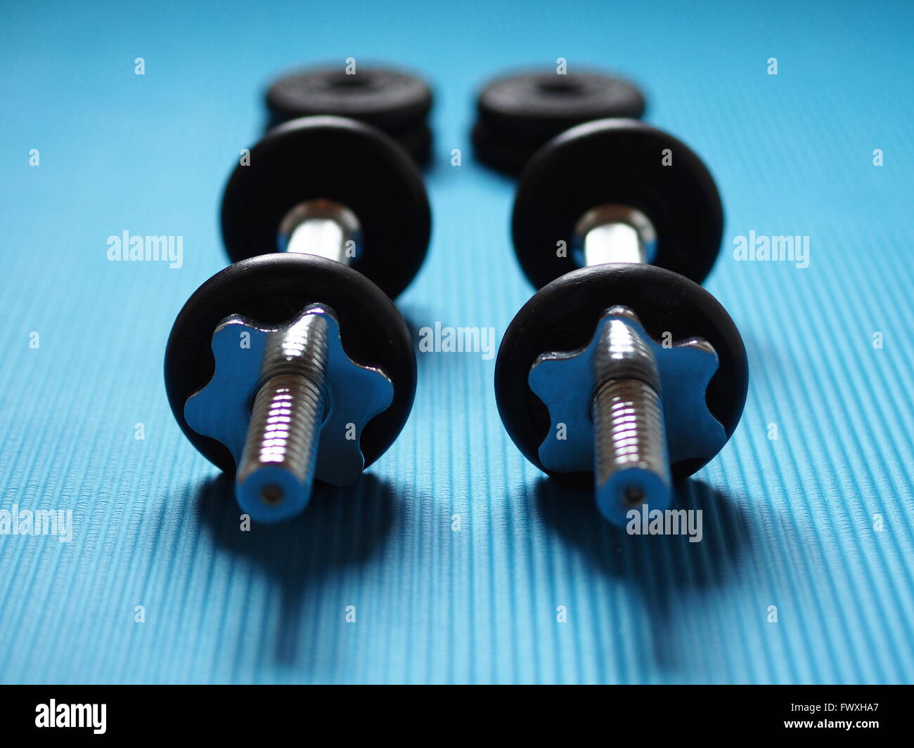 Blue weights hi-res stock photography and images - Alamy