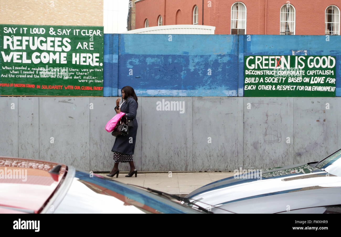 Pro-refugees and anti-Capitalism signs in Dalston, London Stock Photo ...
