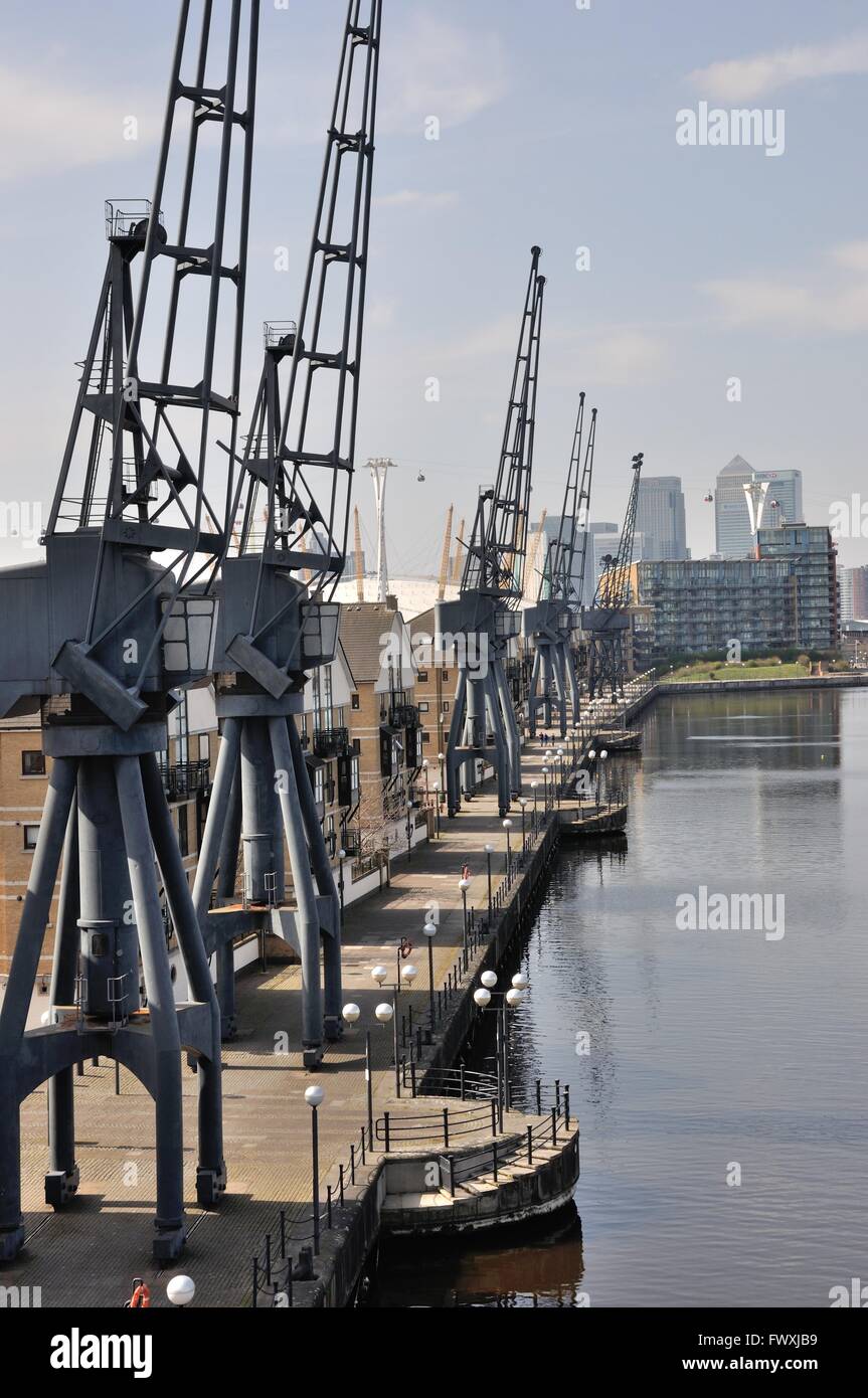Cranes along the side of the Royal Victoria Dock, Silvertown, East ...