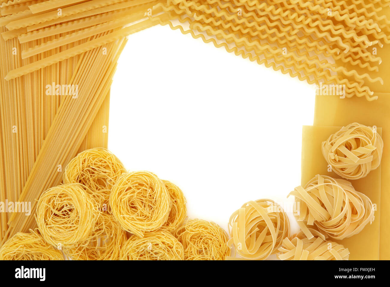 Spaghetti pasta dried food abstract border over white background Stock ...
