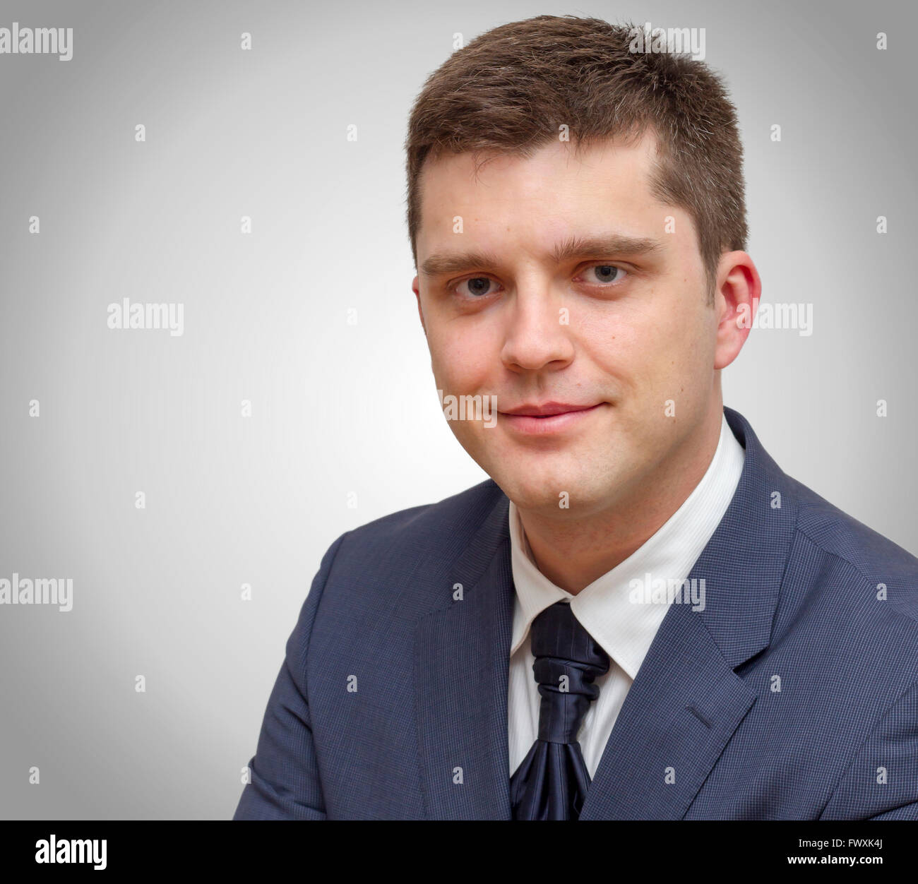 Studio portrait of business man Stock Photo - Alamy
