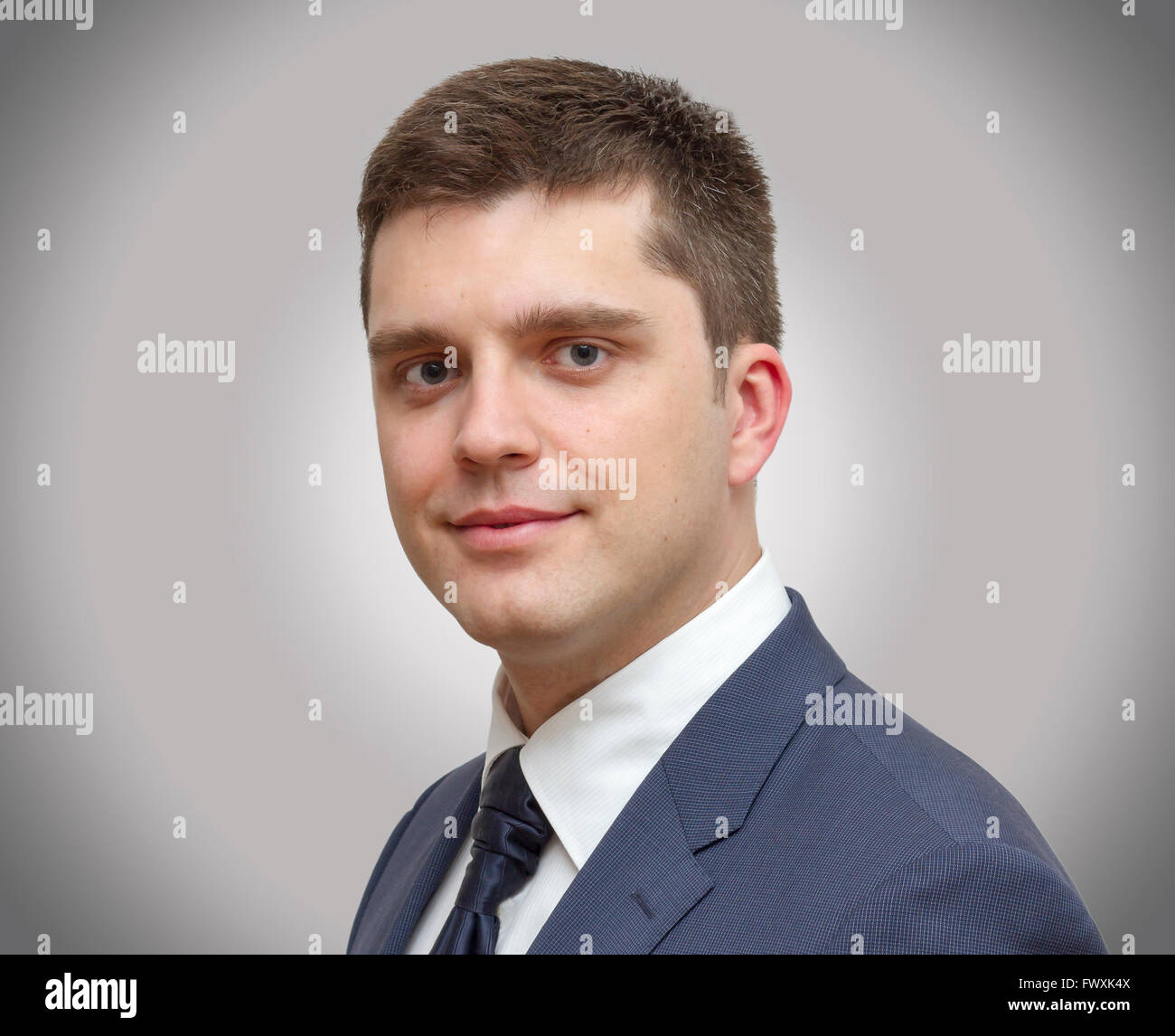 Studio portrait of business man Stock Photo - Alamy