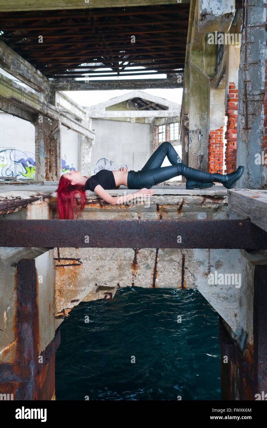 Laying lying down position posture hi-res stock photography and images ...