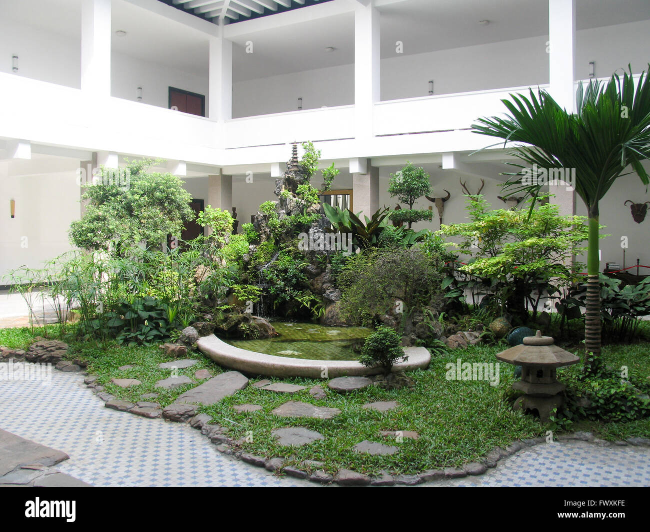 A courtyard garden and pond Stock Photo - Alamy