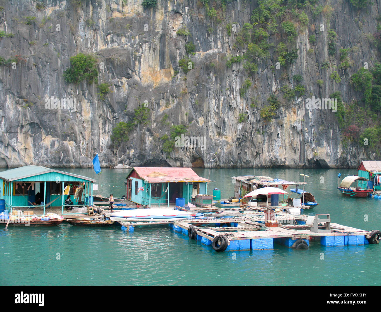 Traditional floating fishing village in Halong Bay, Vietnam Stock Photo ...