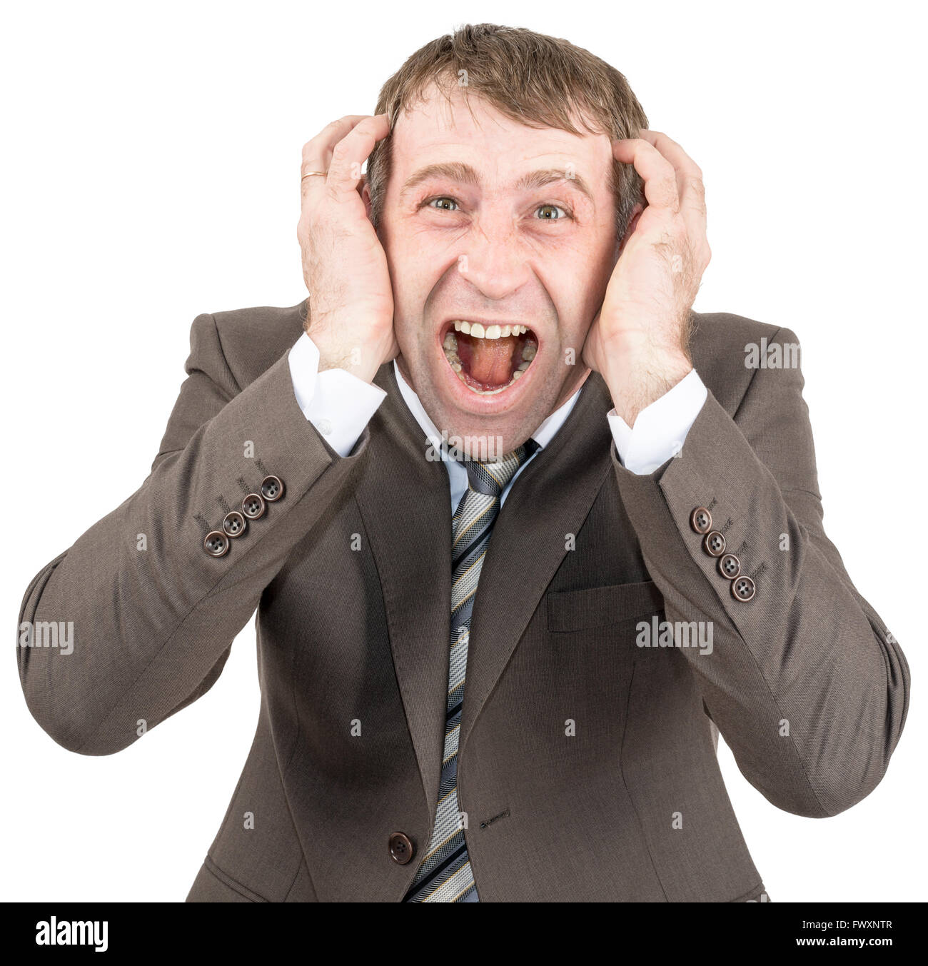 Screaming businessman looking at camera Stock Photo - Alamy
