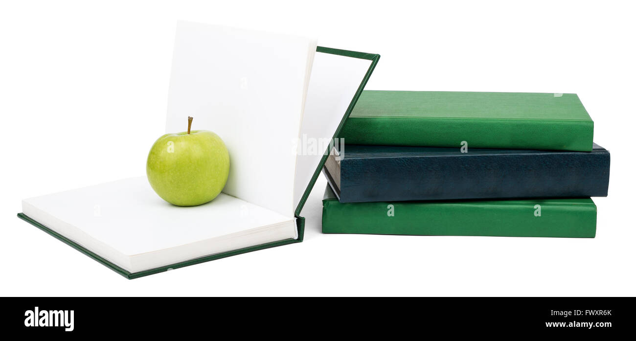 Notebooks with green apple Stock Photo - Alamy