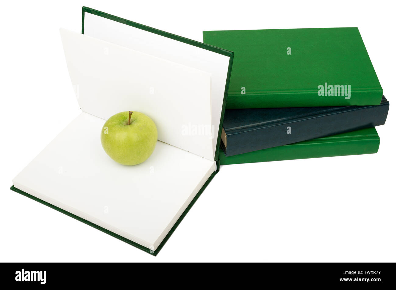 Notebooks with green apple Stock Photo - Alamy