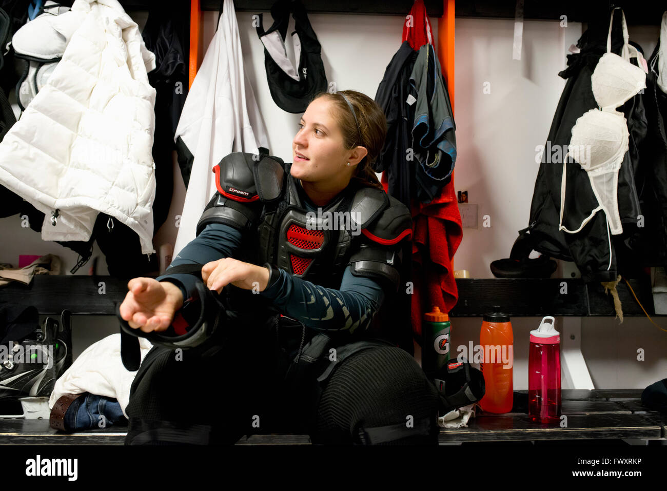 Woman getting dressed locker room hi-res stock photography and images ...