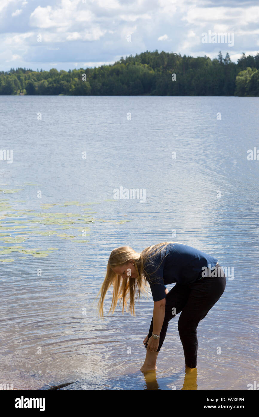 Woman Wading In Water High Resolution Stock Photography and Images - Alamy