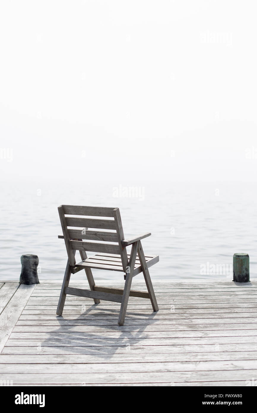 Chair standing outdoors hi-res stock photography and images - Alamy