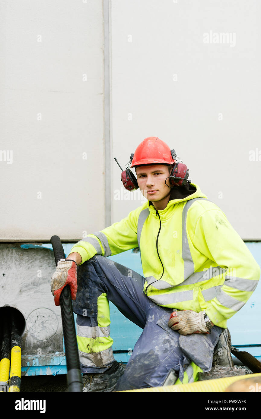 Holding Pipe High Resolution Stock Photography and Images - Alamy