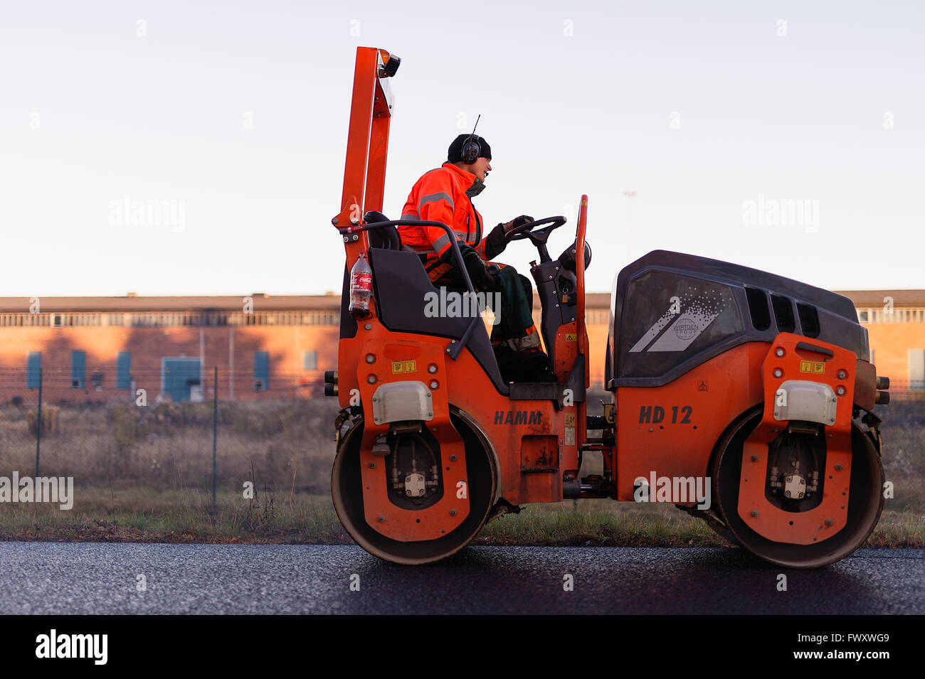 Worker driving hi-res stock photography and images - Alamy