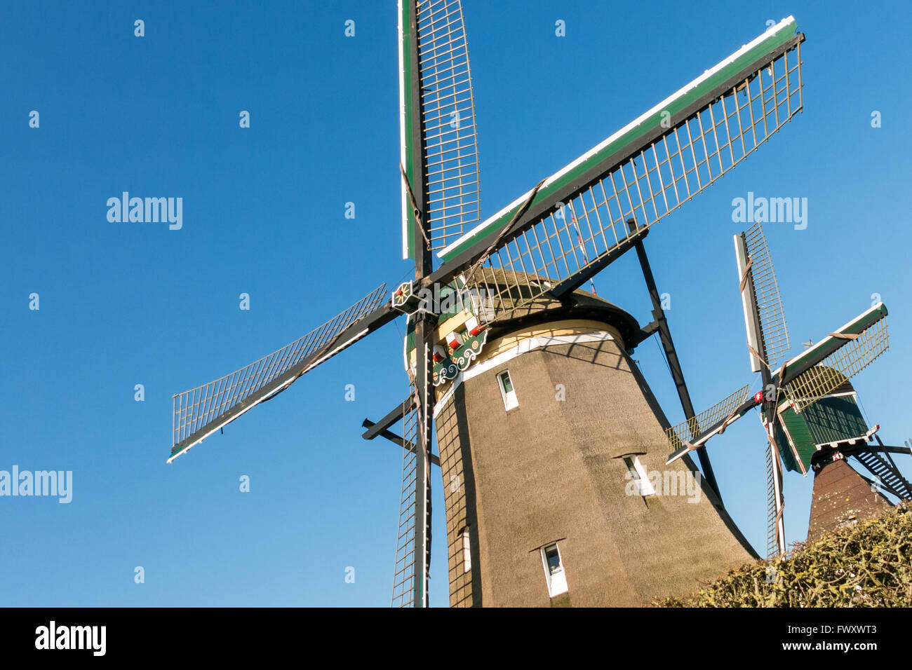 Dutch windmill and miniature windmill near Zevenhuizen in the province ...