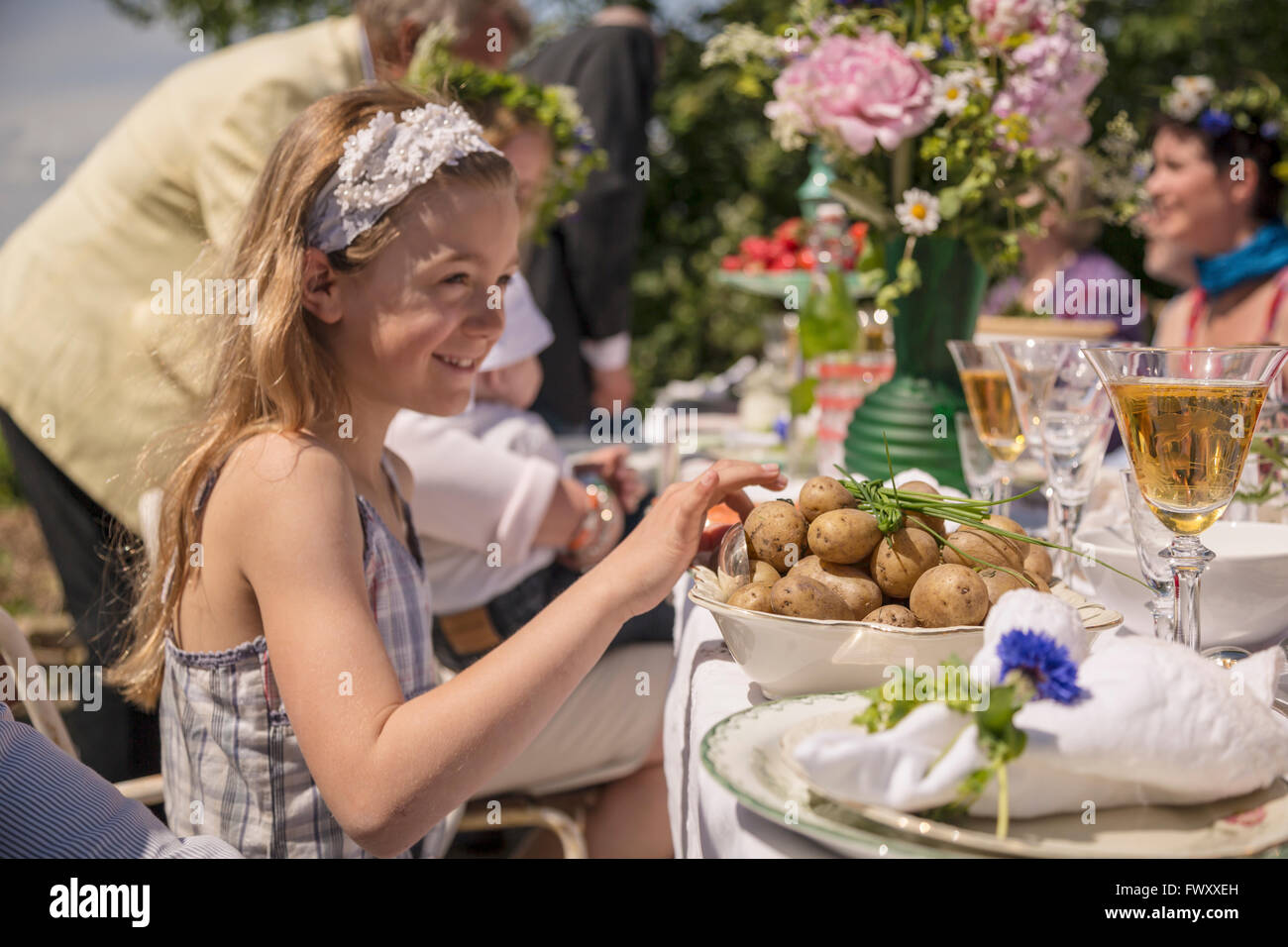 Sweden, Skane, Children (6-11 months, 8-9) celebrating traditional ...