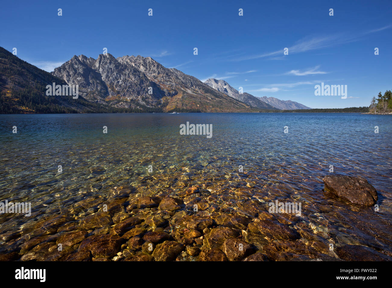 WY01472-00...WYOMING - Shuttle boat on Jenny Lake in Grand Teton ...