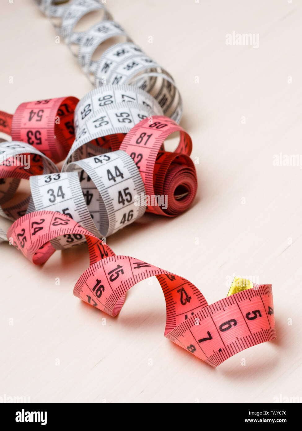 Measure tapes on white hi-res stock photography and images - Alamy