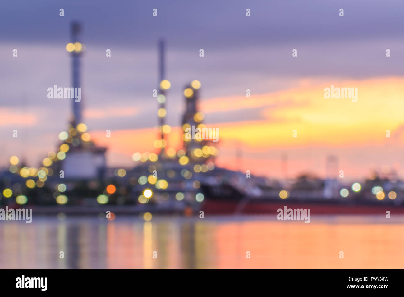 Blurred Oil refinery at twilight. blur backgrounds concept Stock Photo ...