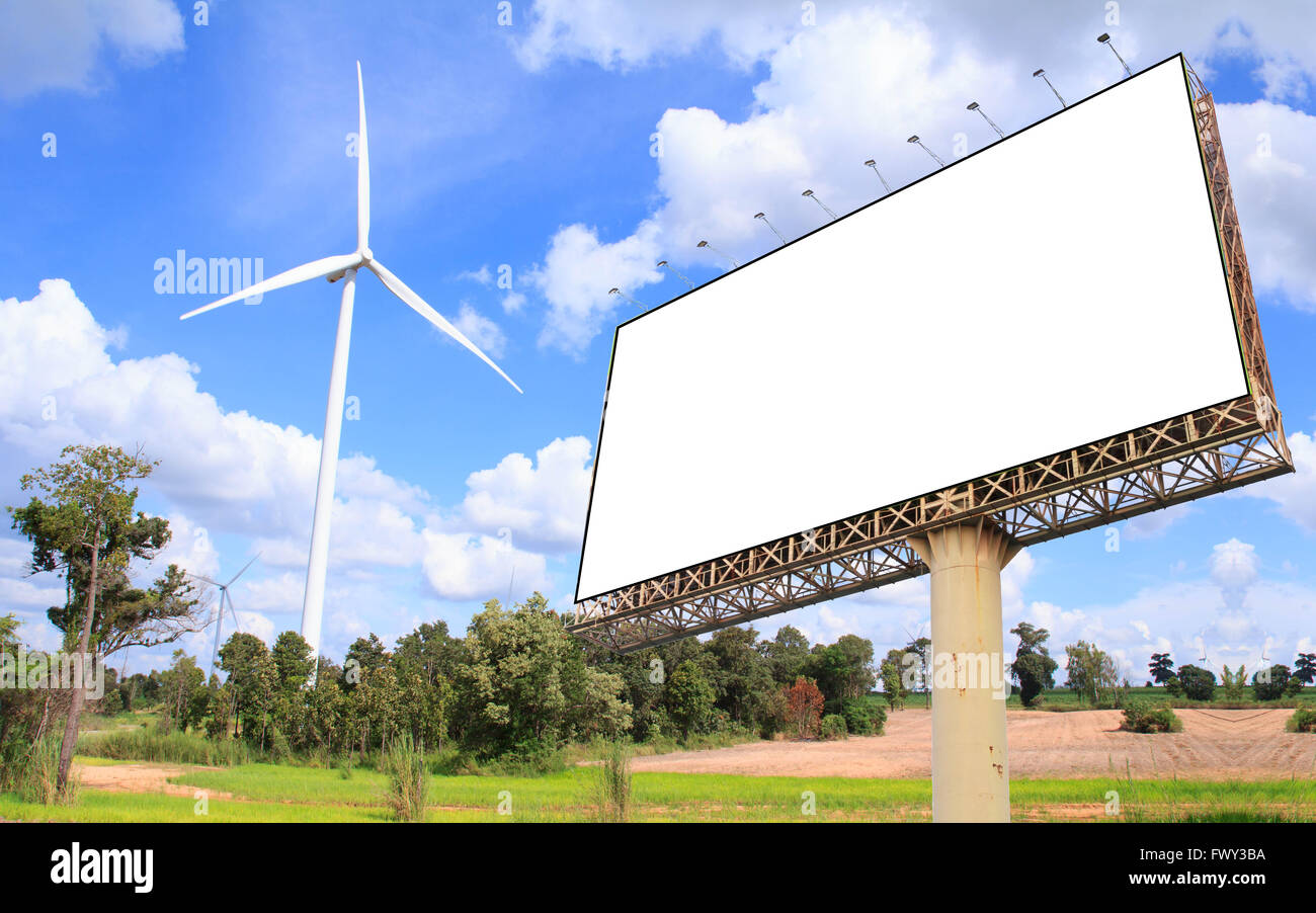 Blank billboard at wind turbine farm for advertisement Stock Photo - Alamy