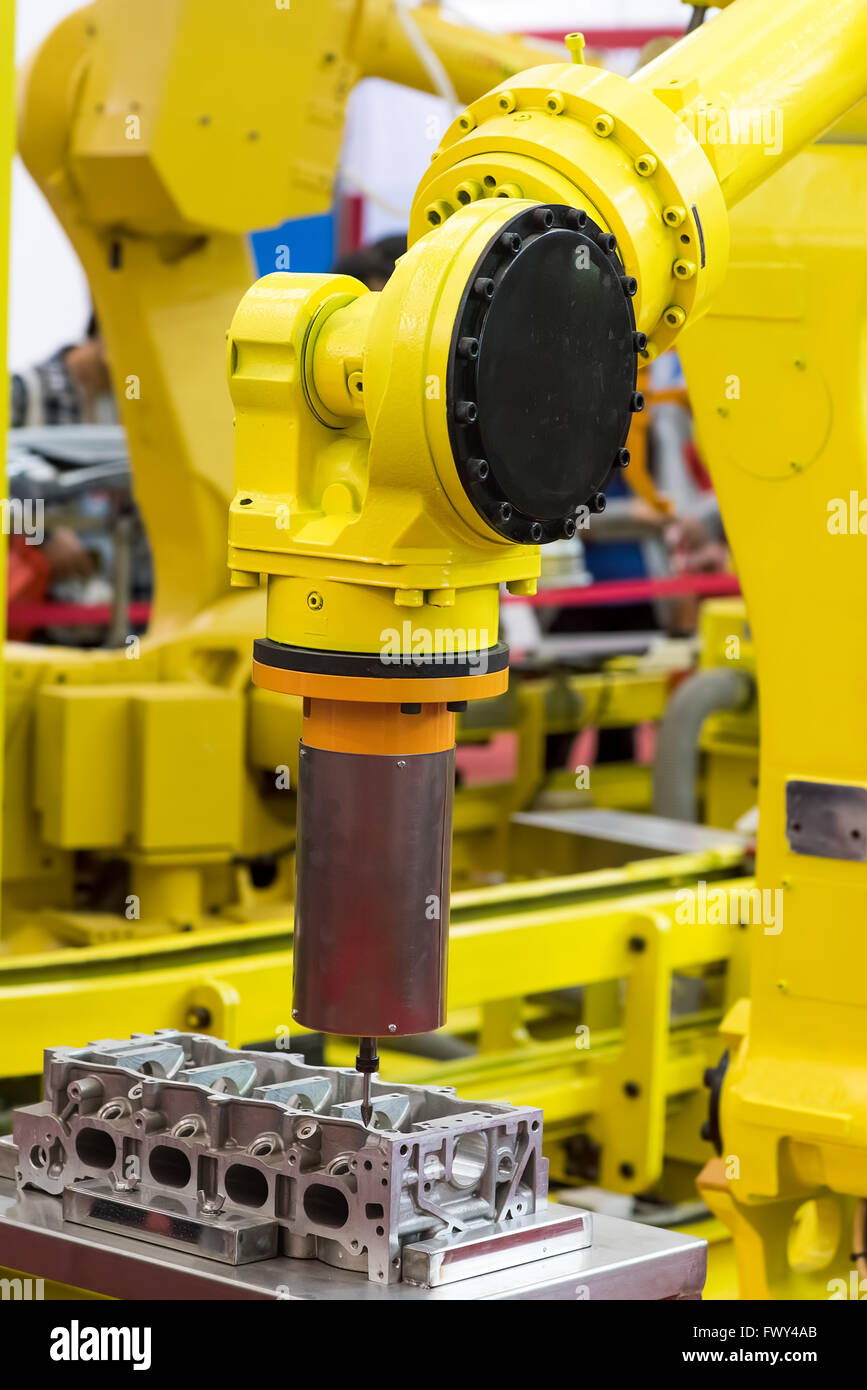 robotic hand machine tool at industrial manufacture factory Stock Photo ...