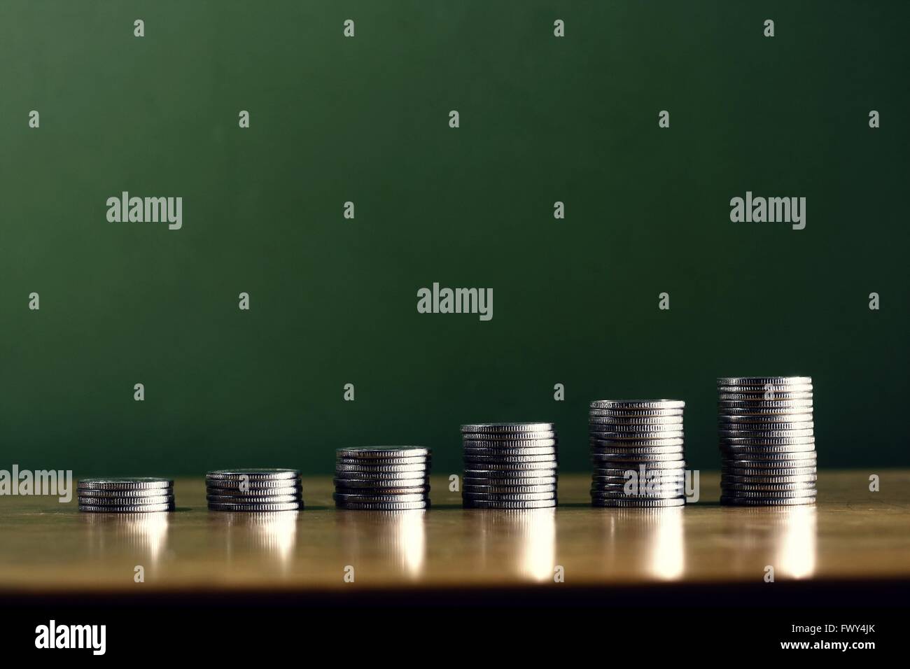 Stack of coins Stock Photo - Alamy