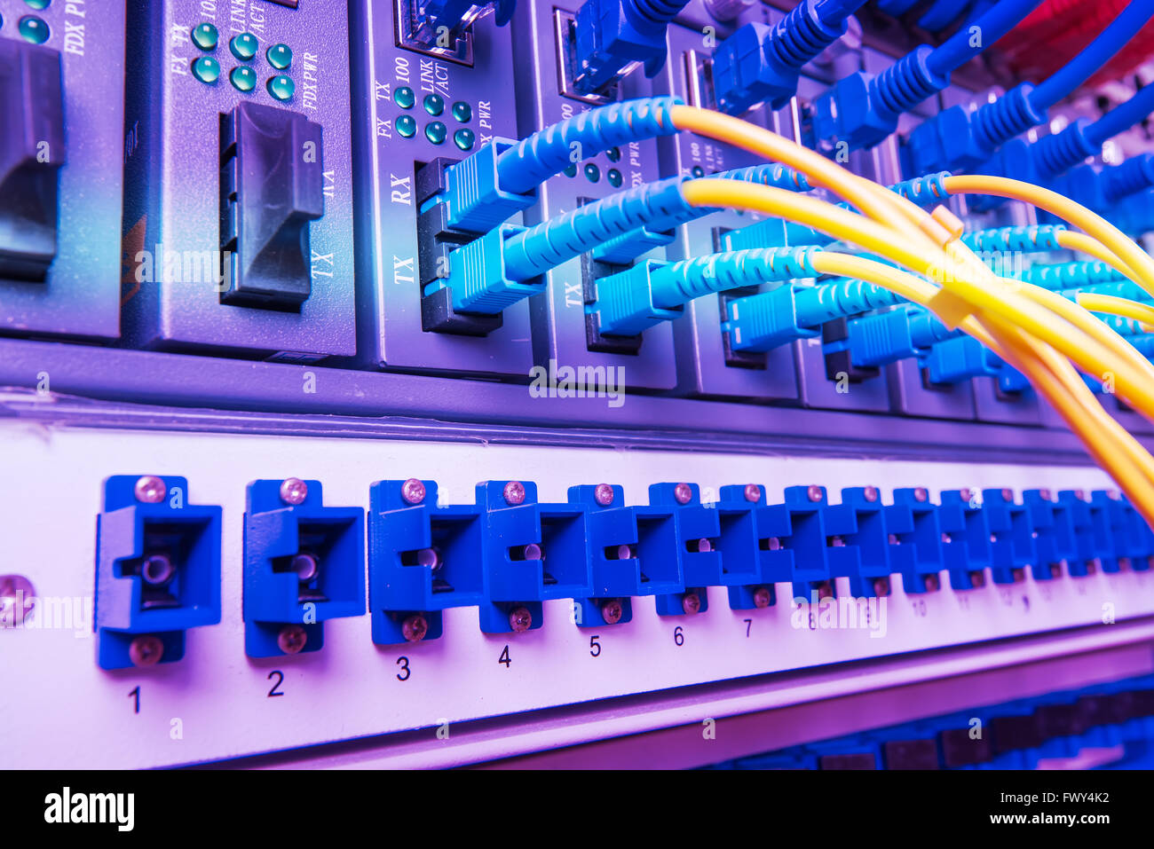 Fiber optic connecting on core network swtich Stock Photo - Alamy