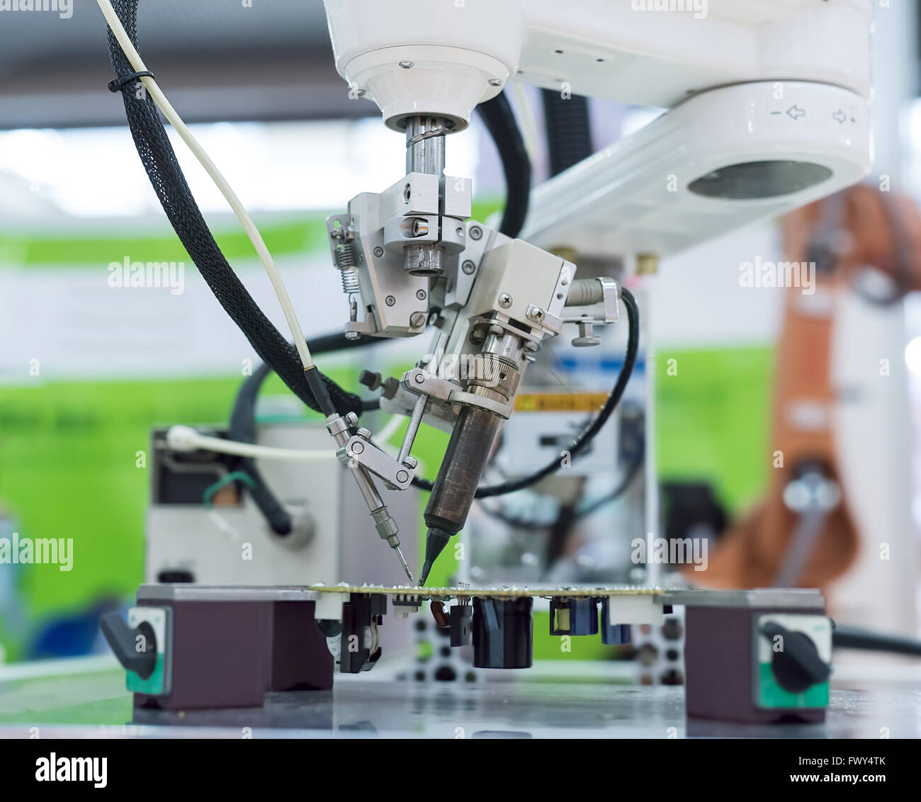 robotic hand machine tool at industrial manufacture factory Stock Photo ...