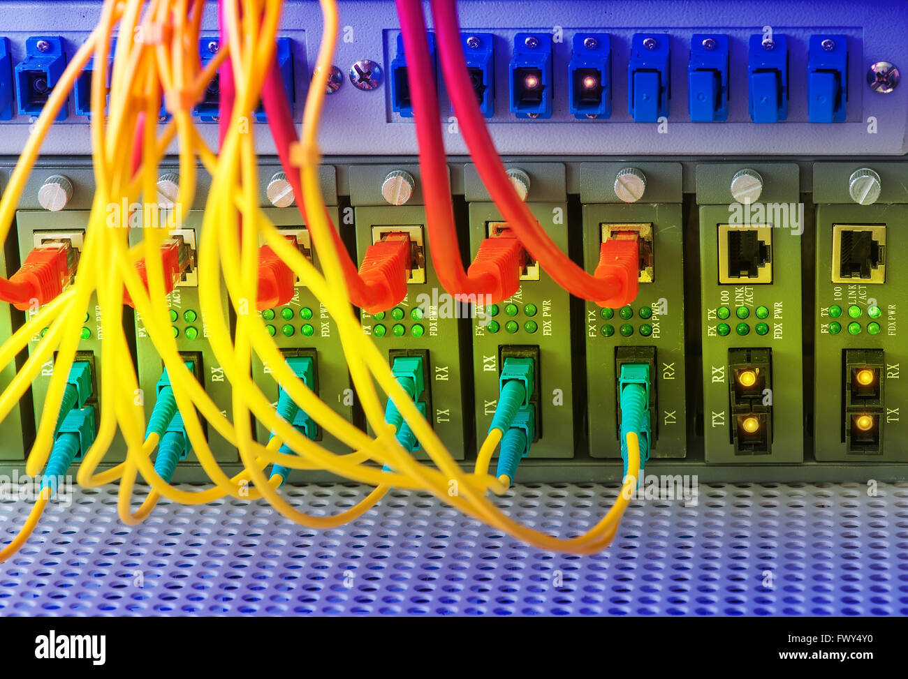 Fiber optic connecting on core network swtich Stock Photo - Alamy