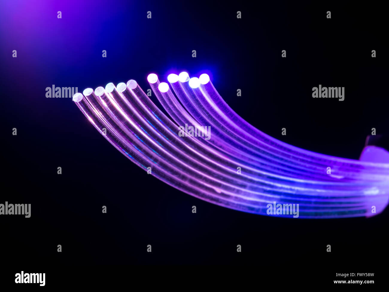 Internet technology fiber optic background Stock Photo - Alamy