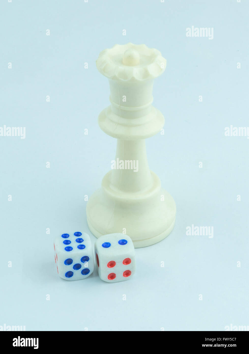 Chess and dice Stock Photo - Alamy