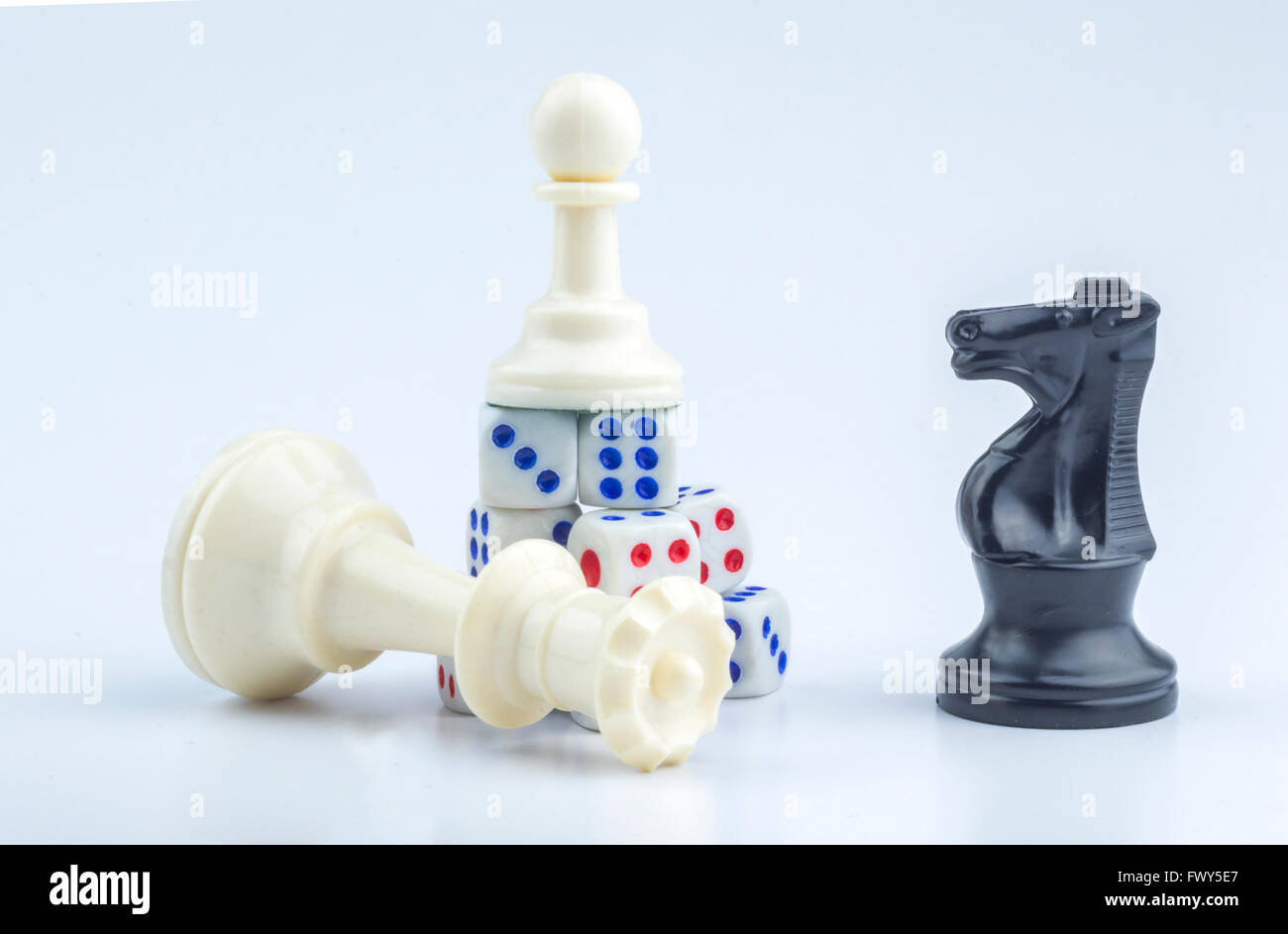 Chess and white dice Stock Photo - Alamy