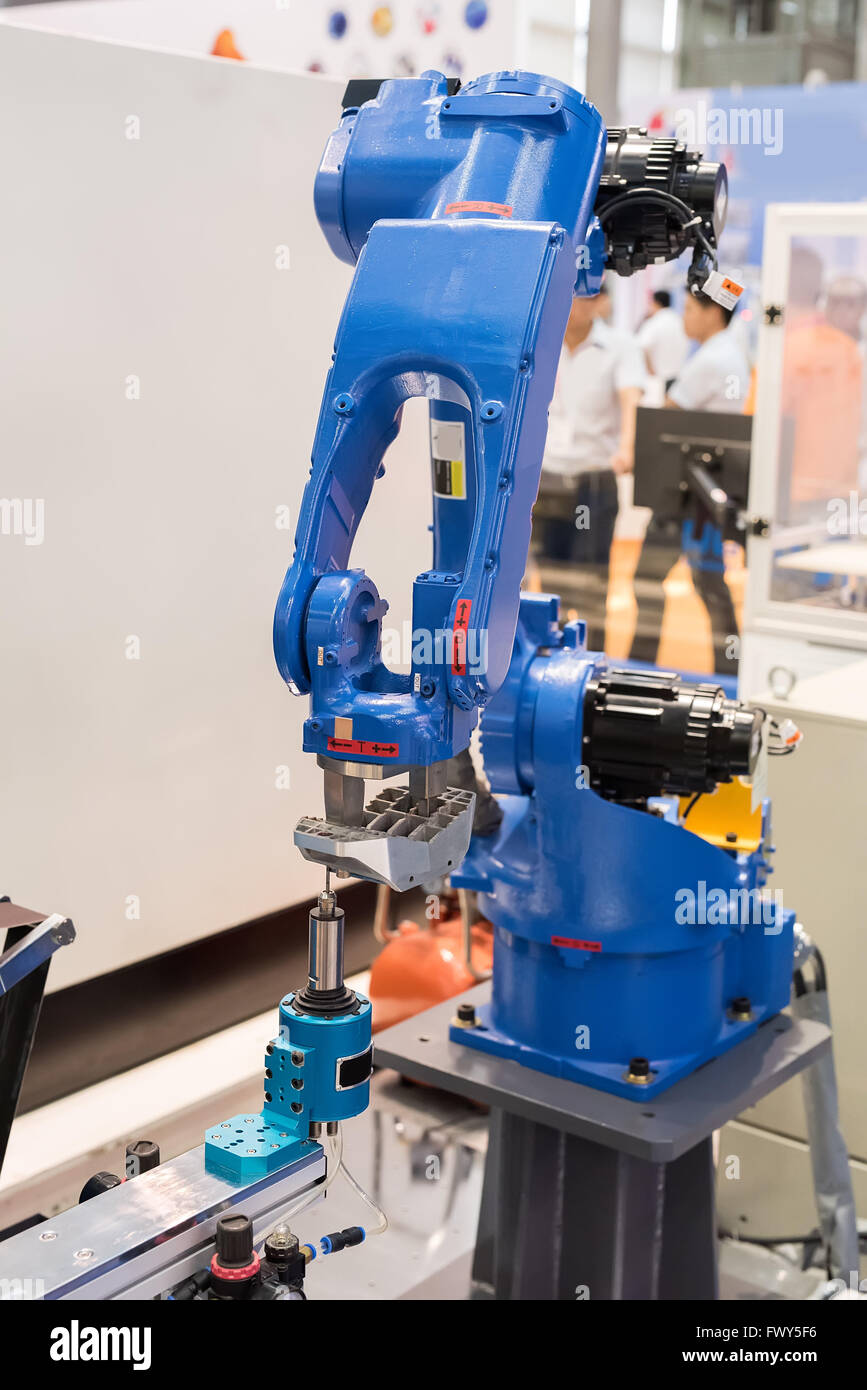 robotic hand machine tool at industrial manufacture factory Stock Photo ...