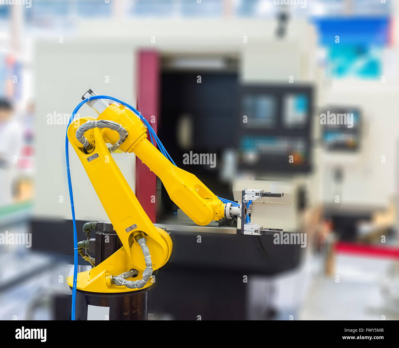 robotic hand machine tool at industrial manufacture factory Stock Photo ...