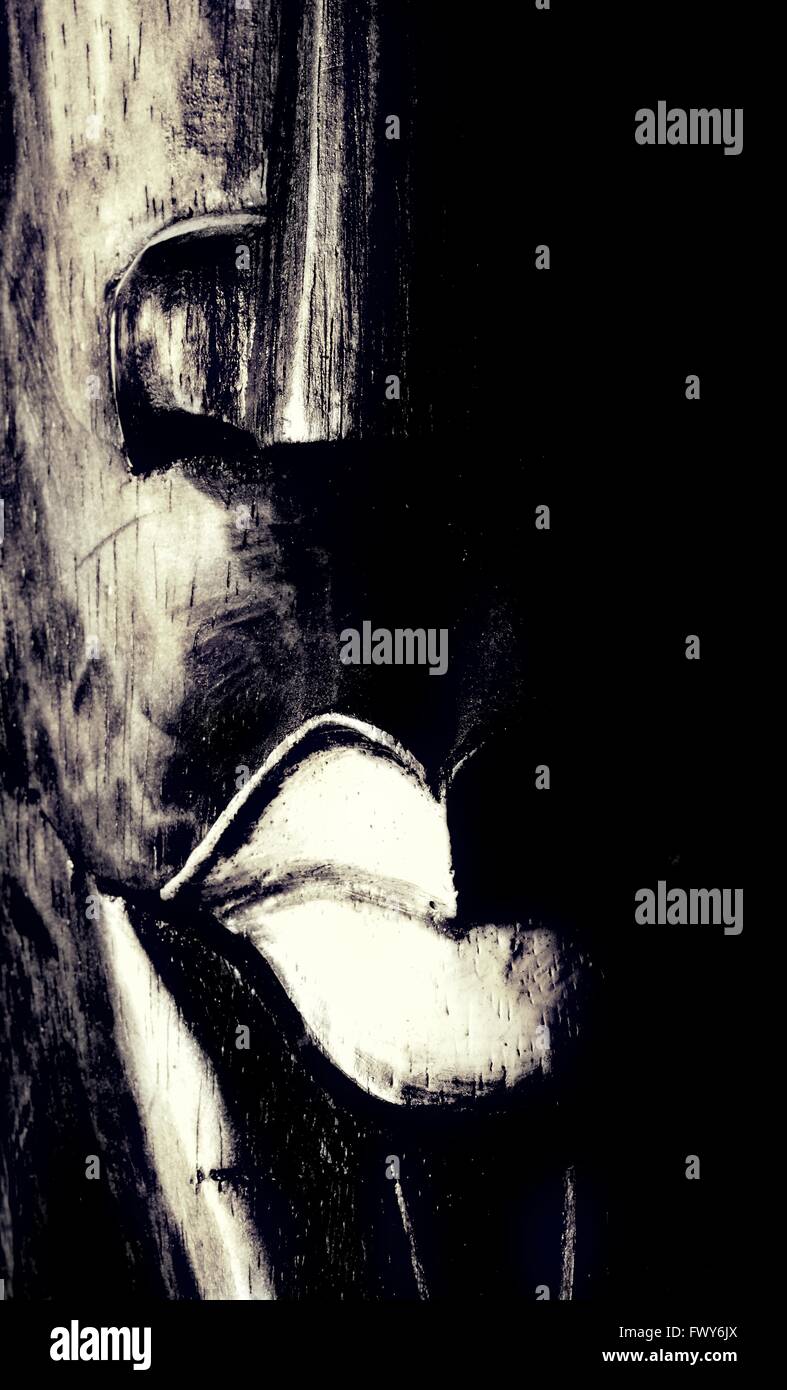 Wooden human face in sidelight, light and shadow head Stock Photo - Alamy