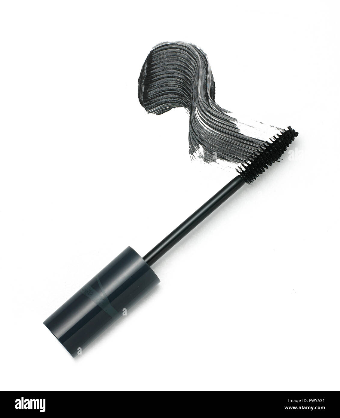 Mascara wand and smear of black mascara Stock Photo - Alamy