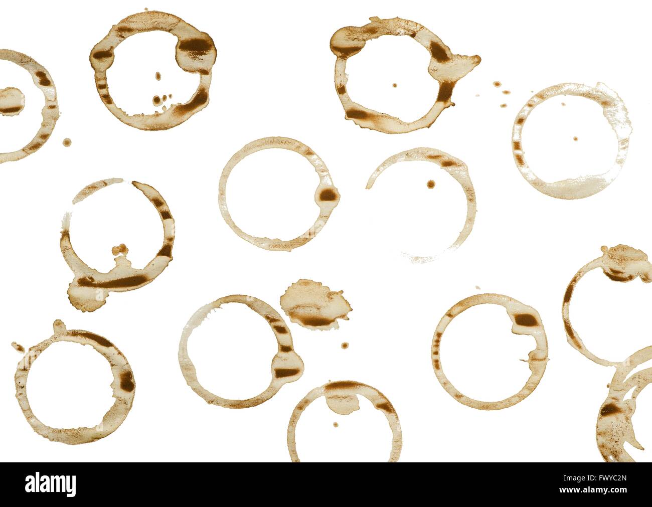 Lot of circle shape coffee stains on white background Stock Photo - Alamy