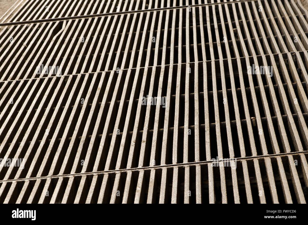 Metal grate bars floor as dangerous construction Stock Photo - Alamy