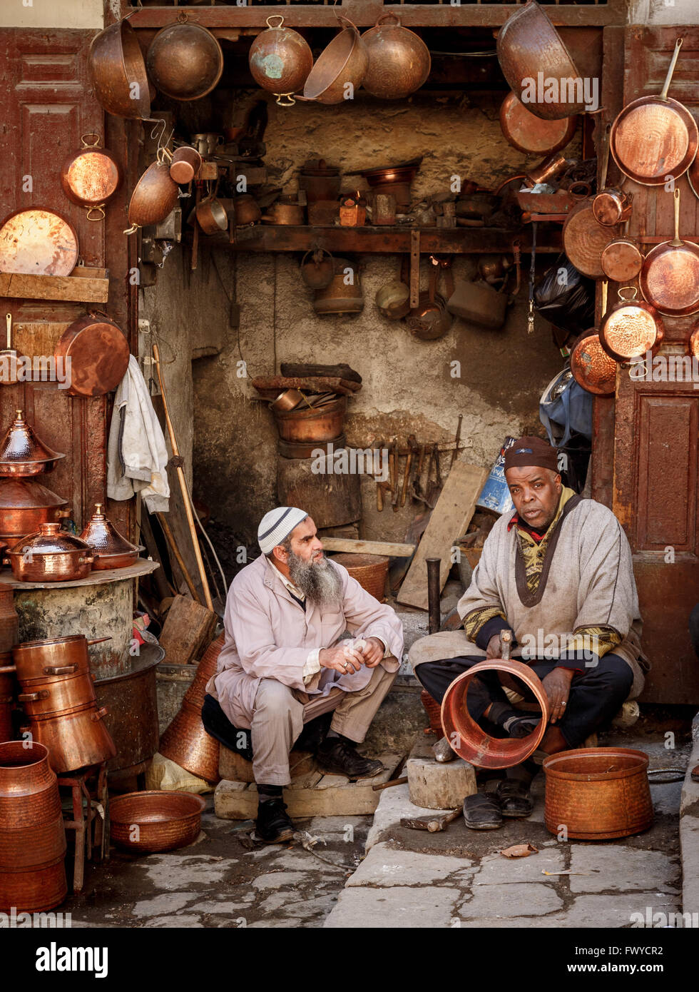 Coppersmith in Fes el bali the coppersmith lane in the Souks of the ...
