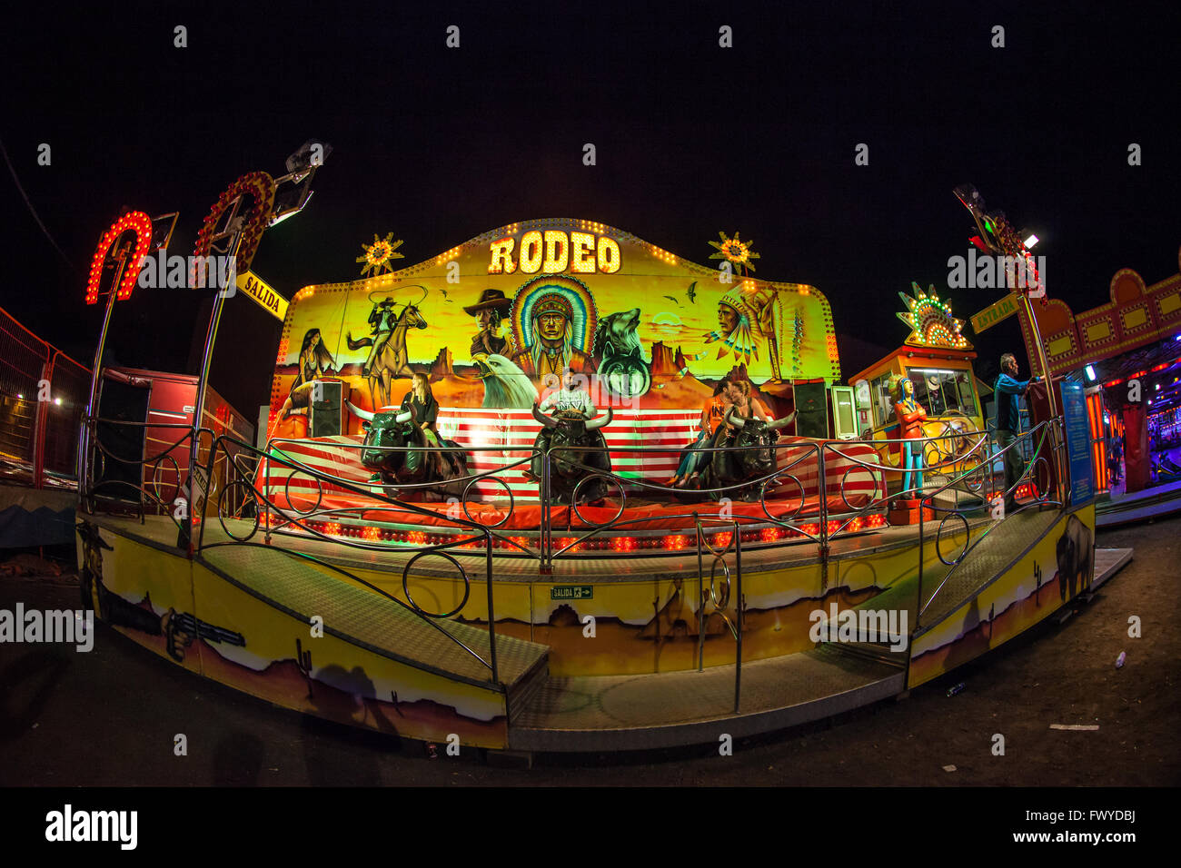 people having fun in a fairground attraction Stock Photo - Alamy