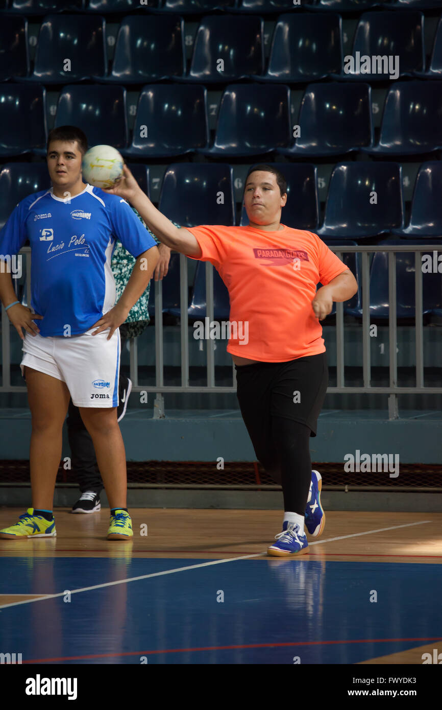 youngsters playing handball in a sports centre Stock Photo - Alamy