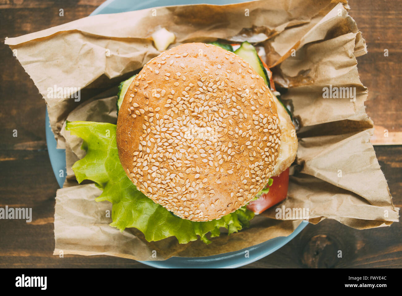 Home made fastfood burger on paper Stock Photo - Alamy