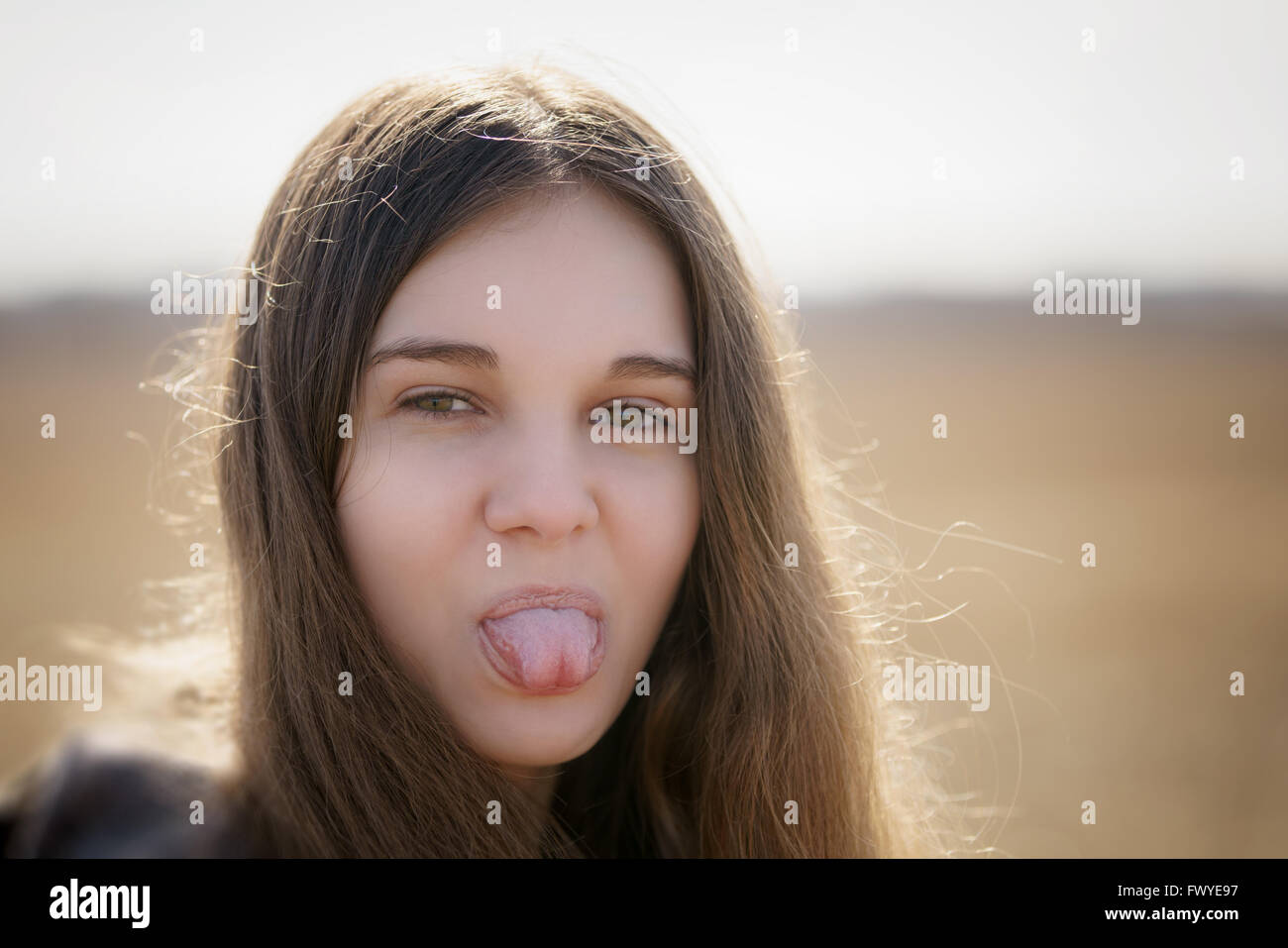 close up portrait of young girl showing tongue Stock Photo - Alamy close up portrait of young girl showing tongue Stock Photo - Alamy