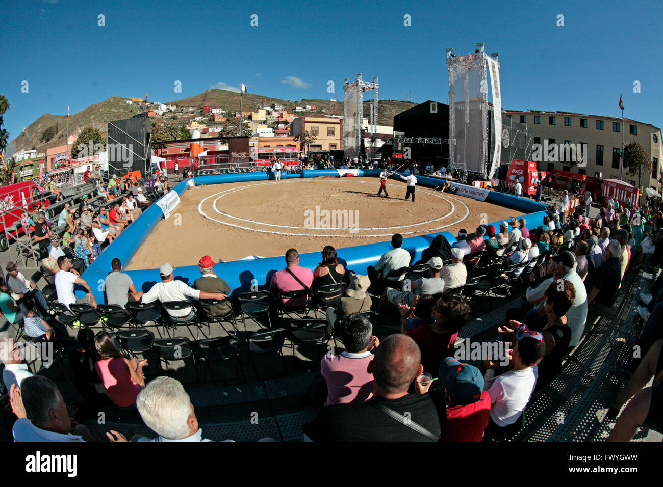 Teens playing the canarian stick wrestling in a public exhibition in ...