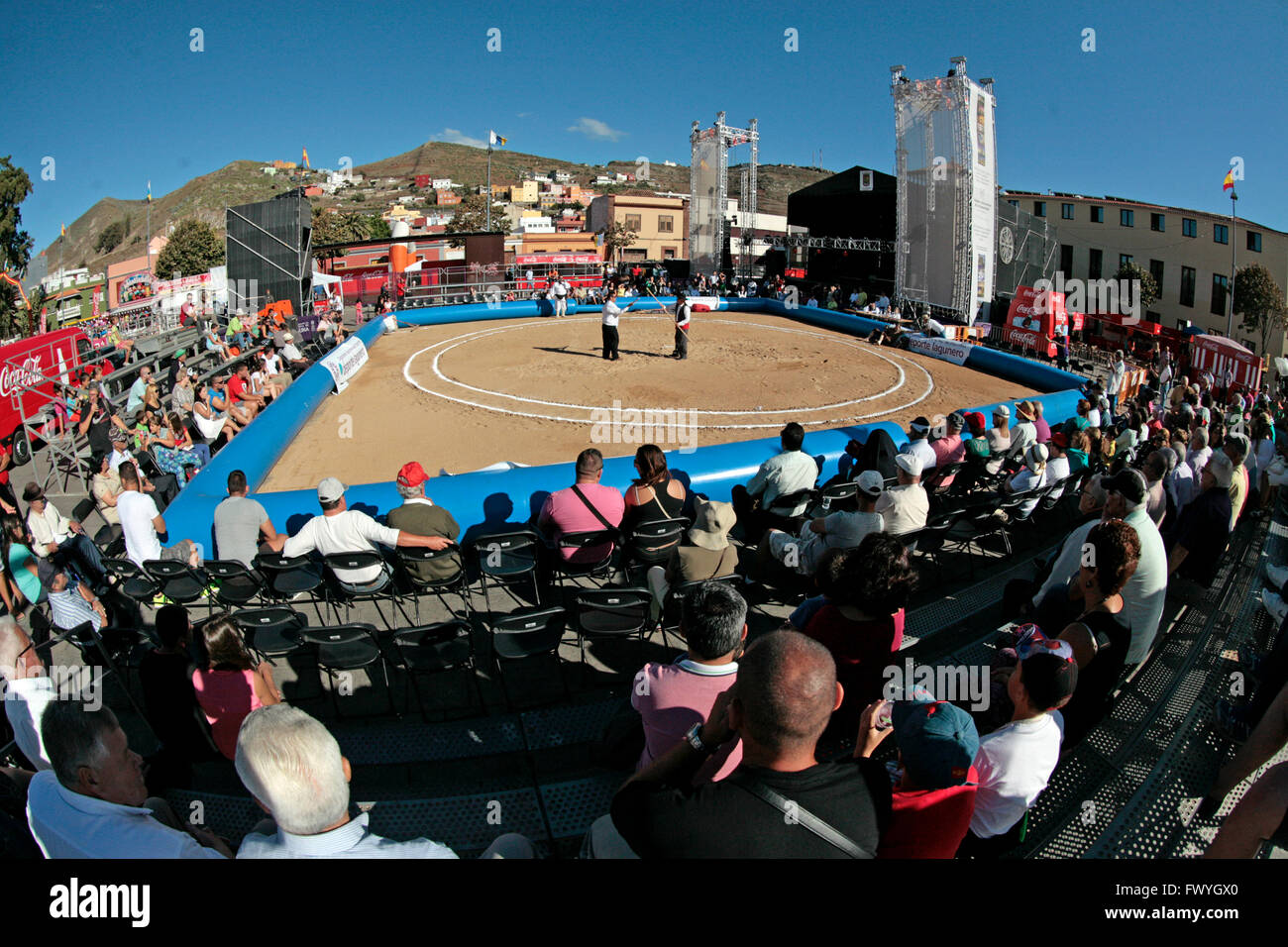 Teens playing the canarian stick wrestling in a public exhibition in ...