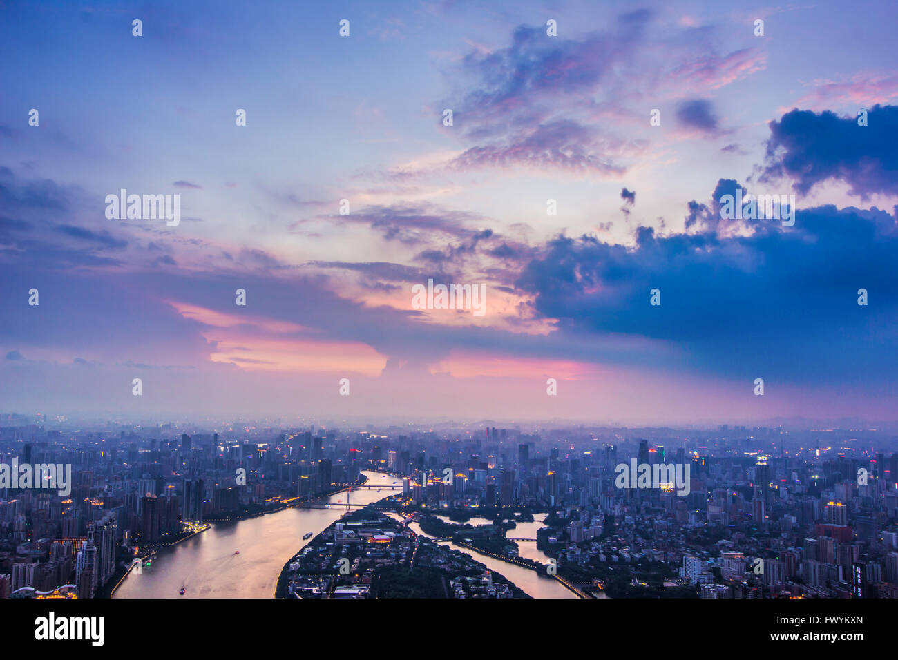 Guangzhou over a beautiful sunset at dusk Stock Photo - Alamy
