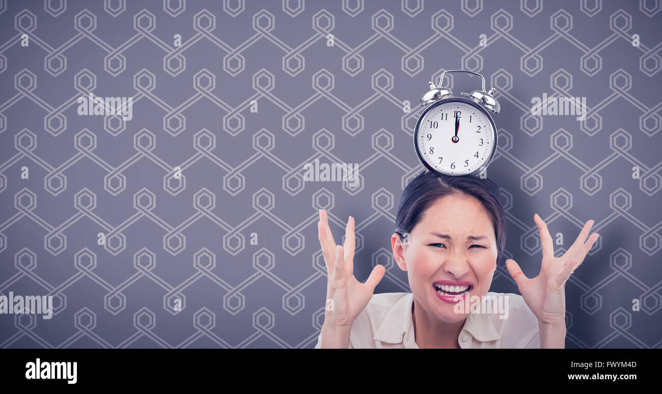 Composite image of midnight time on clock Stock Photo - Alamy